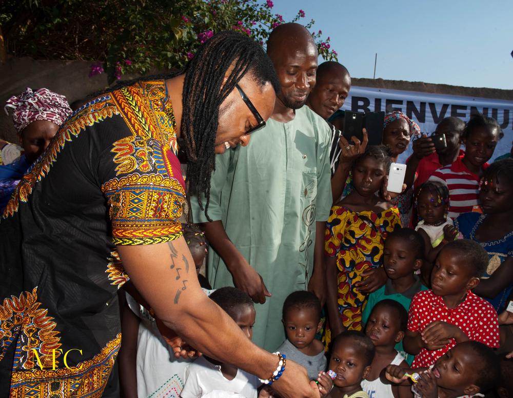Flavour gives back in Mali during West African Tour | BellaNaija