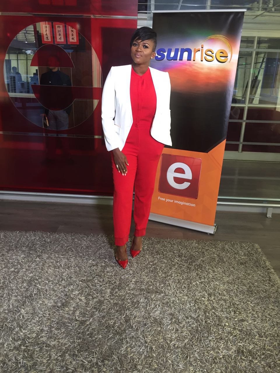 Waje is Flawless in a Red Jumpsuit for Live Africa Day Performance in S ...
