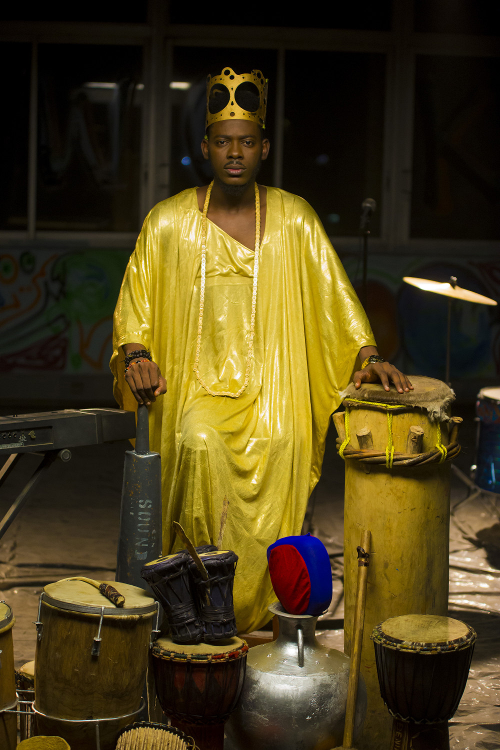 Adekunle Gold is the “Golden King of Music” in New Photos | BellaNaija