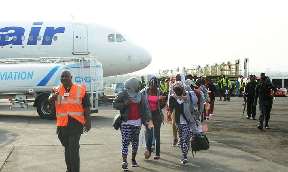 Libya Returnees protest ₦1,000 Transport Allowance | BellaNaija