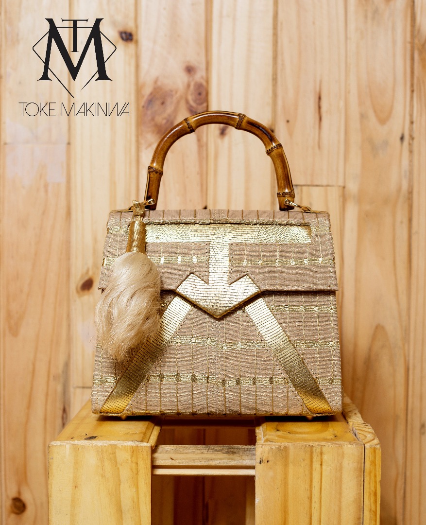 Toke Makinwa Luxury unveils “Omotoke Bag”| It comes in Fiery Red, Gold ...