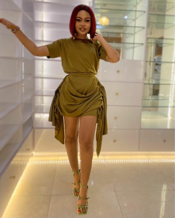 Teniola Aladese Puts an Olive Twist on the Mini Skirt Trend | BellaNaija