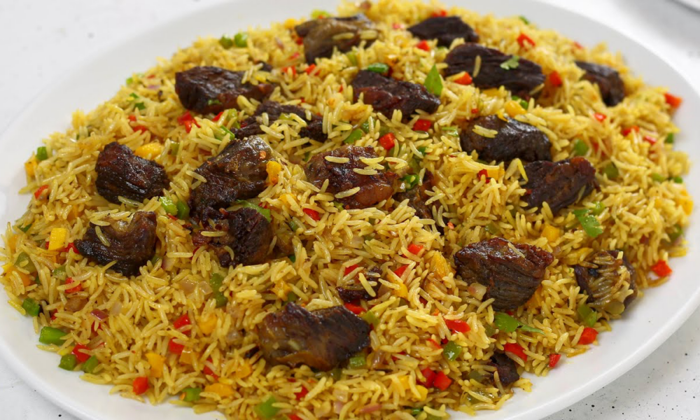 Kikifoodies’ Asun Jollof Rice Recipe is a Must-Try | BellaNaija
