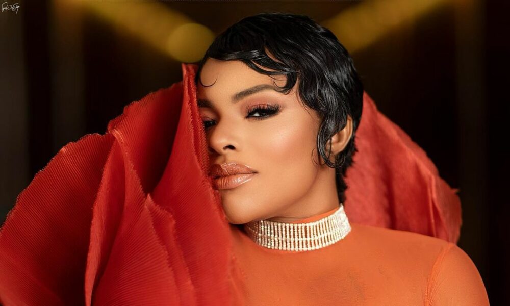 Laura Ikeji Kanu Channelled Exotic in an Orange Bloom Outfit by Erica Moore at the 10th AMVCA ...