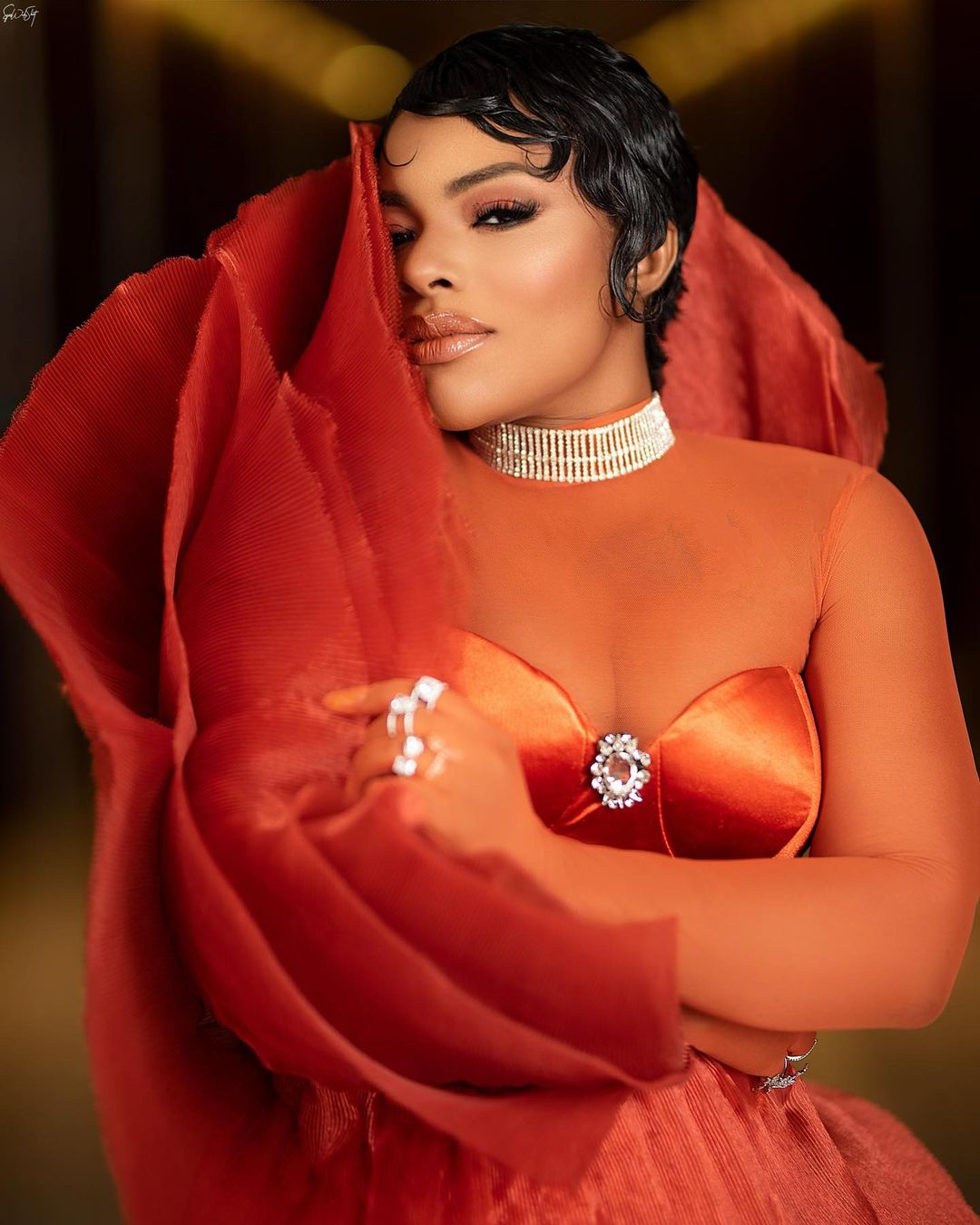 Laura Ikeji Kanu Channelled Exotic in an Orange Bloom Outfit by Erica Moore at the 10th AMVCA ...
