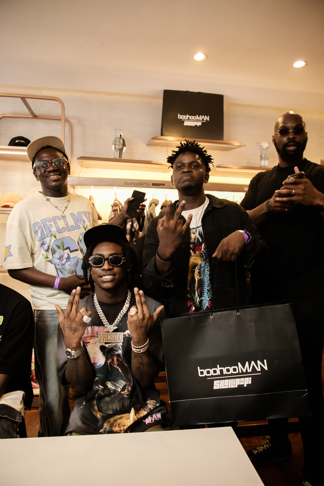 BoohooMAN Nigeria Debuts with a Star-Studded Event and Shallipopi ...