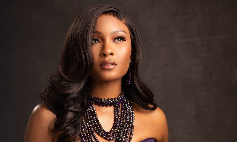 Osas Ighodaro Channels Elegance and Edge in Deep Plum & Black | BellaNaija