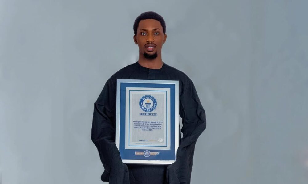 Samuel Chinecherem Ezeh’s 51-Metre Sleeves Earn Him a Guinness World Record | BellaNaija