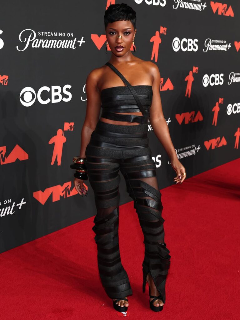 Ayra Starr Gave Us Fashion Geometry Lesson in Black Leather & Mesh at ...
